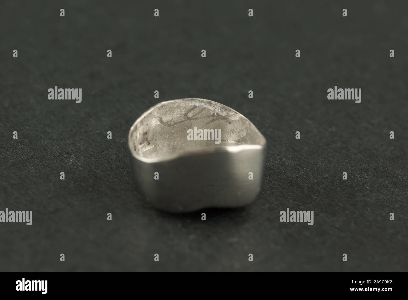 Dental metal tooth crowns isolated on white background Stock Photo - Alamy