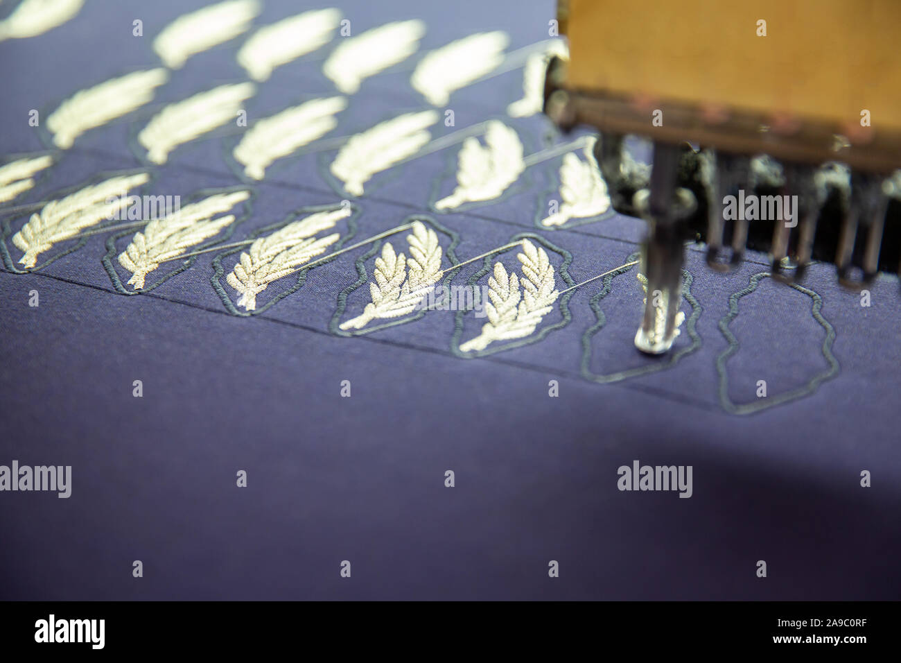 Close up with embroidery machine working. Work in progress Stock Photo ...