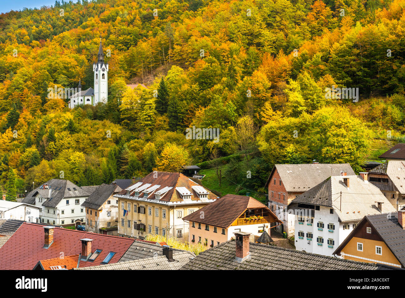 The village of Kropa, Slovenia with fall foliage color Stock Photo - Alamy