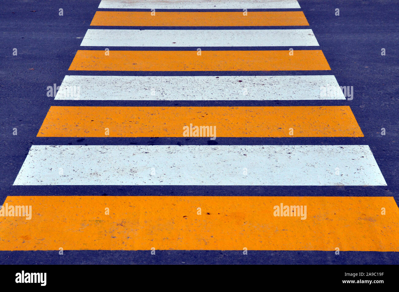 Road marking. Crosswalk, yellow and white lines Background Stock Photo ...