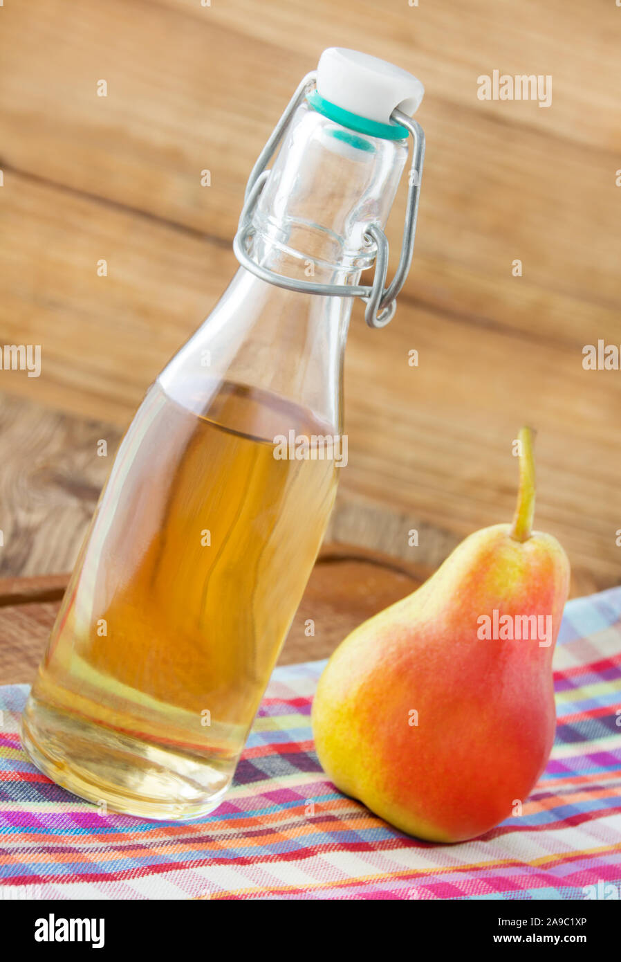 Pear juice glass bottle hi-res stock photography and images - Alamy