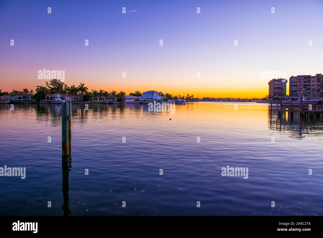 Sunrise over Florida waterfront homes and marina Stock Photo - Alamy