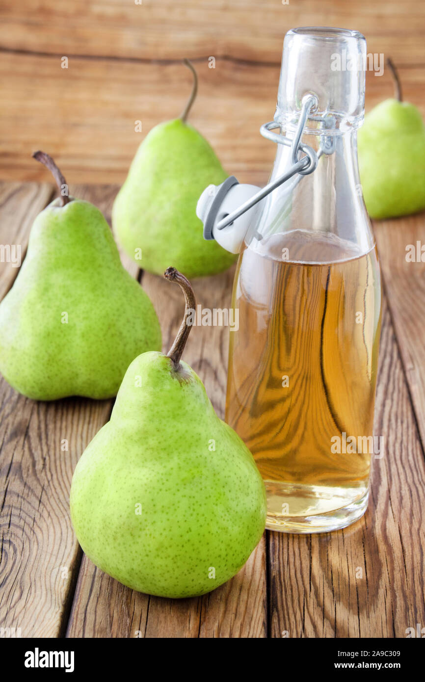 Pears juice bottle and fresh fruits Stock Photo - Alamy