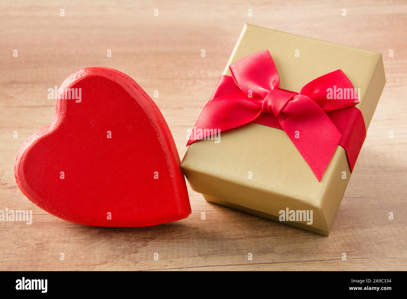 Red heart and gift Stock Photo - Alamy