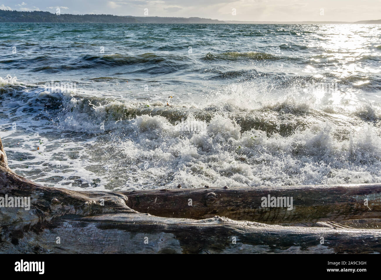 Wave from the Puget Sound hit rocks on the shoreline in Des Moines ...