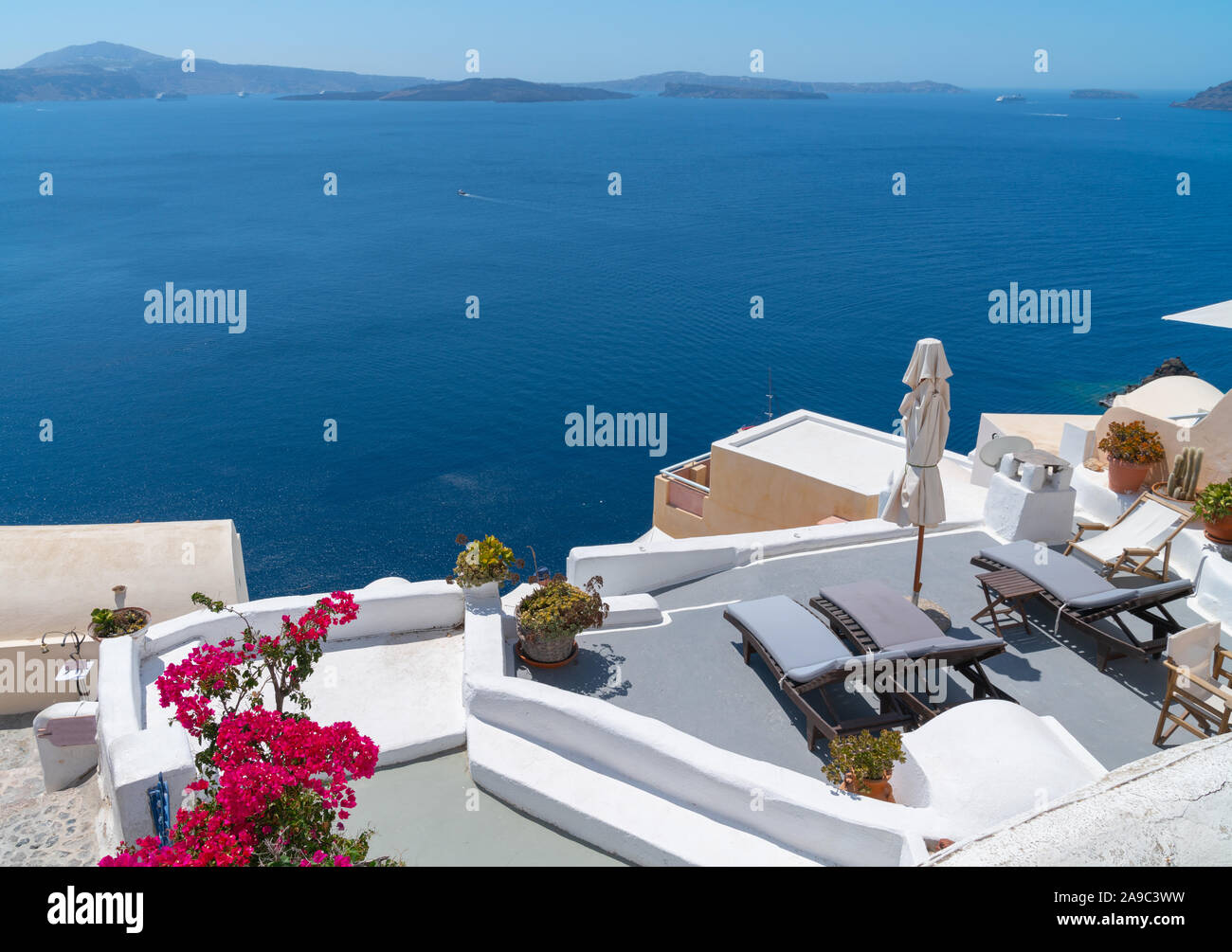 View out across Mediterranean over hillside homes and buildings in ...