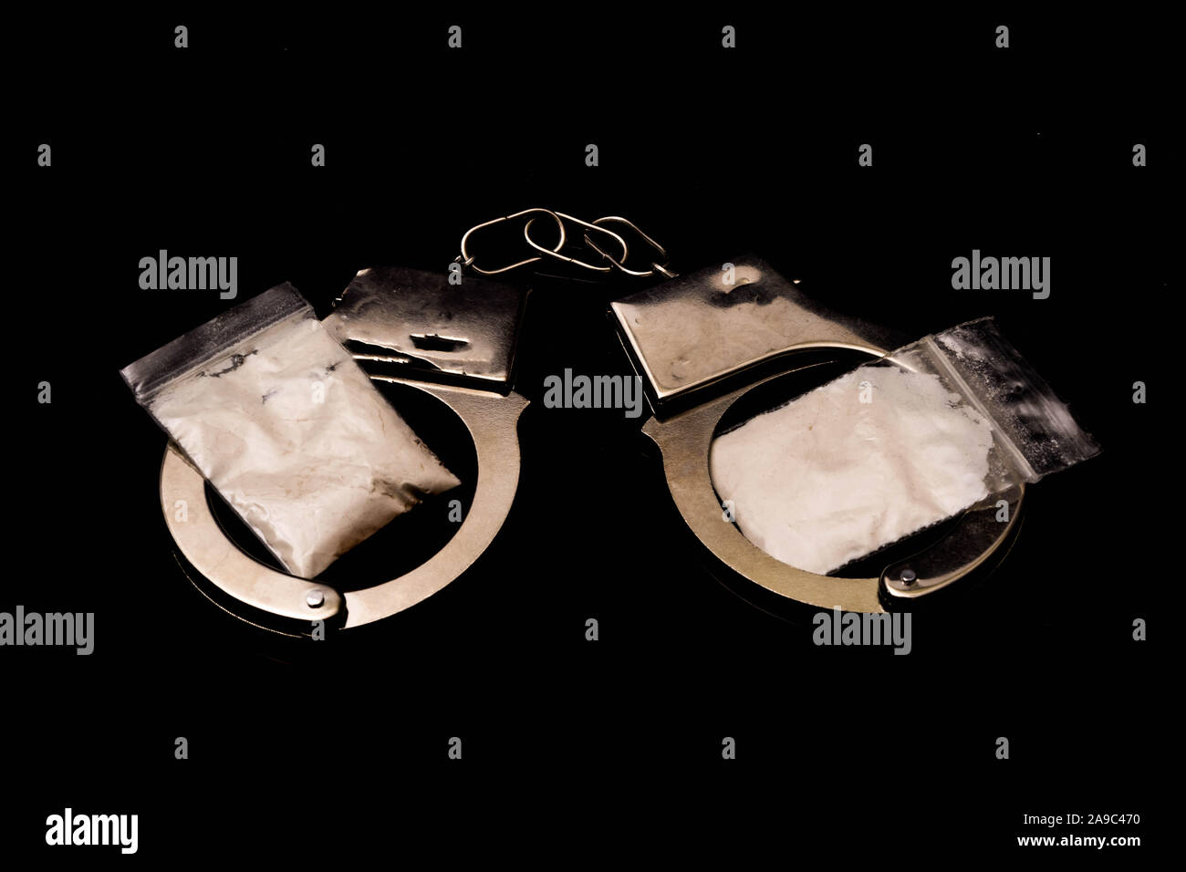 Plastic handcuffs hi-res stock photography and images - Alamy