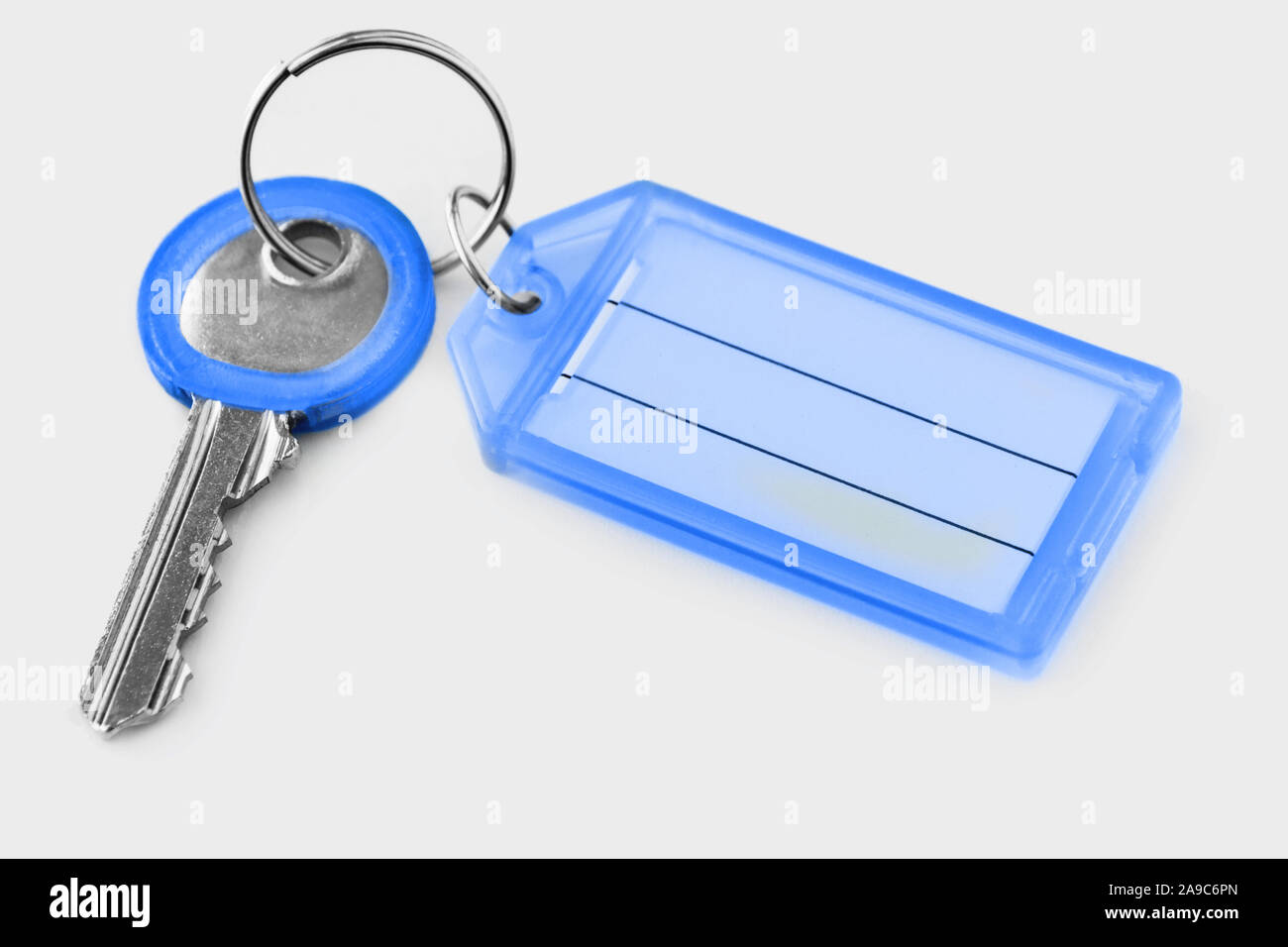 Key and blue label background Stock Photo - Alamy