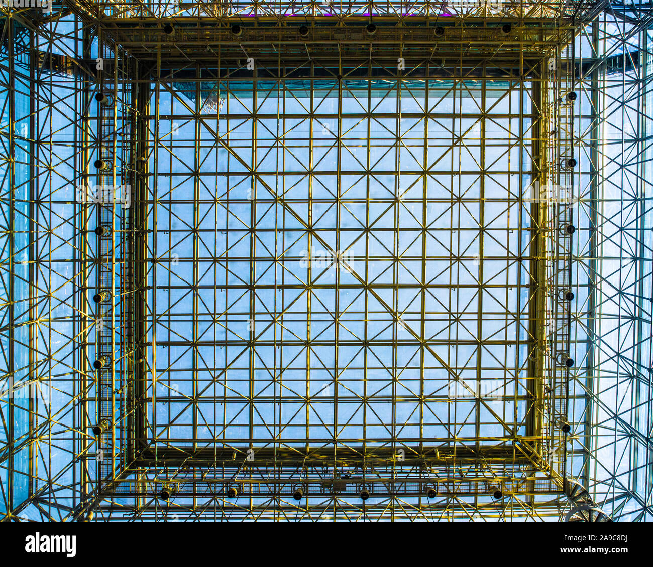 straight up perspective view of modern glass and metal girder ceiling ...
