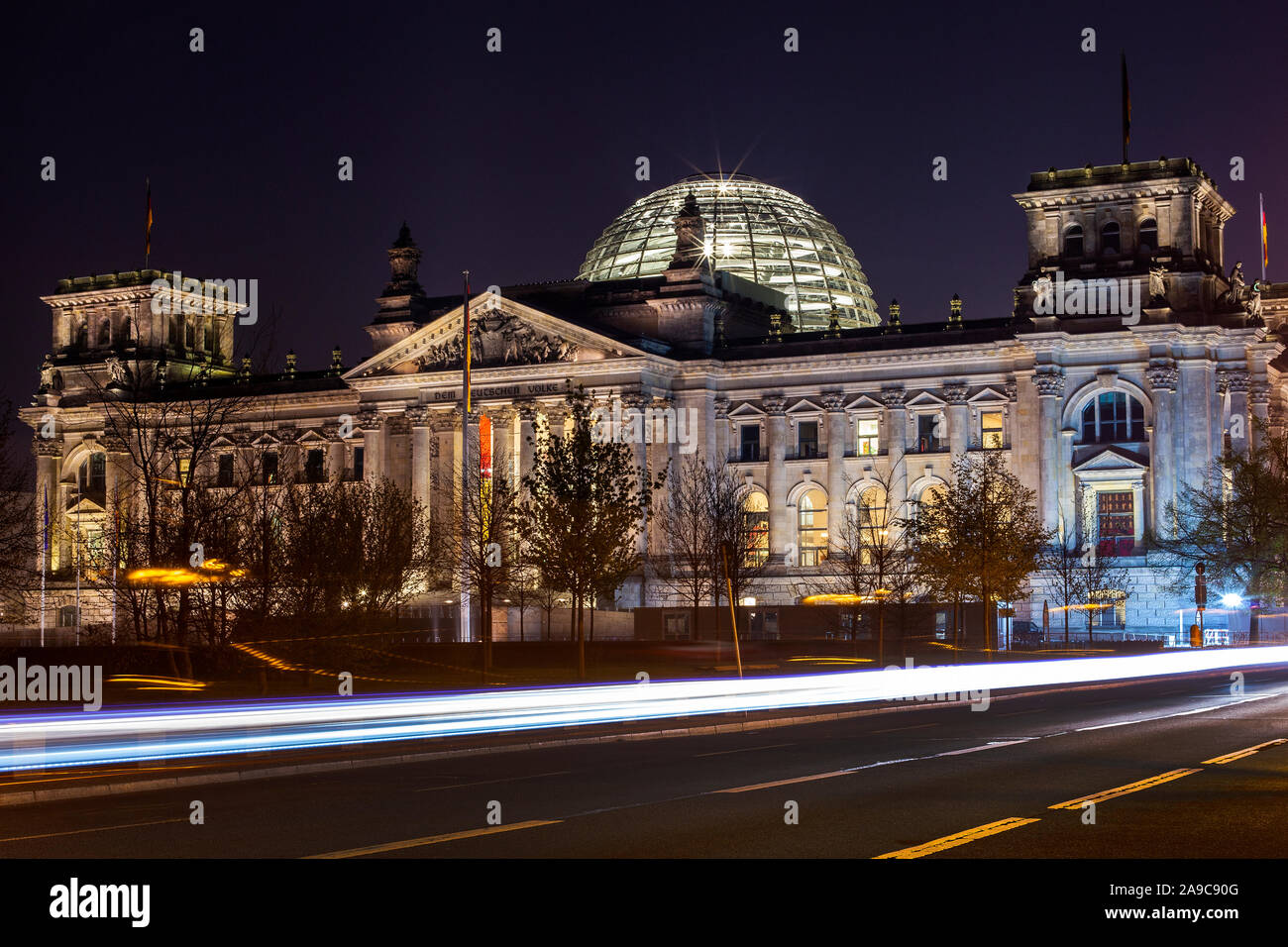 A night-time view of the historic Reichstag building in the city of ...