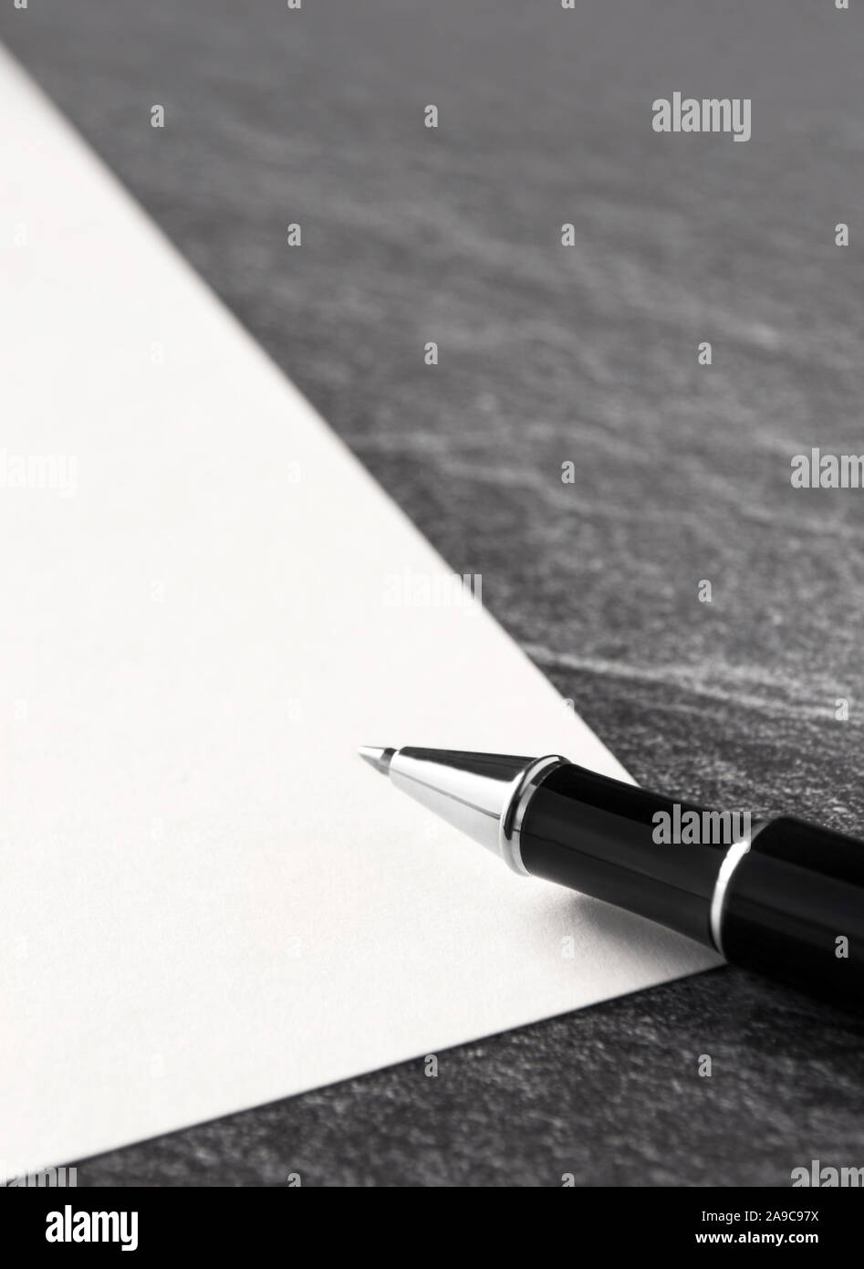 Papier and pen background Stock Photo - Alamy