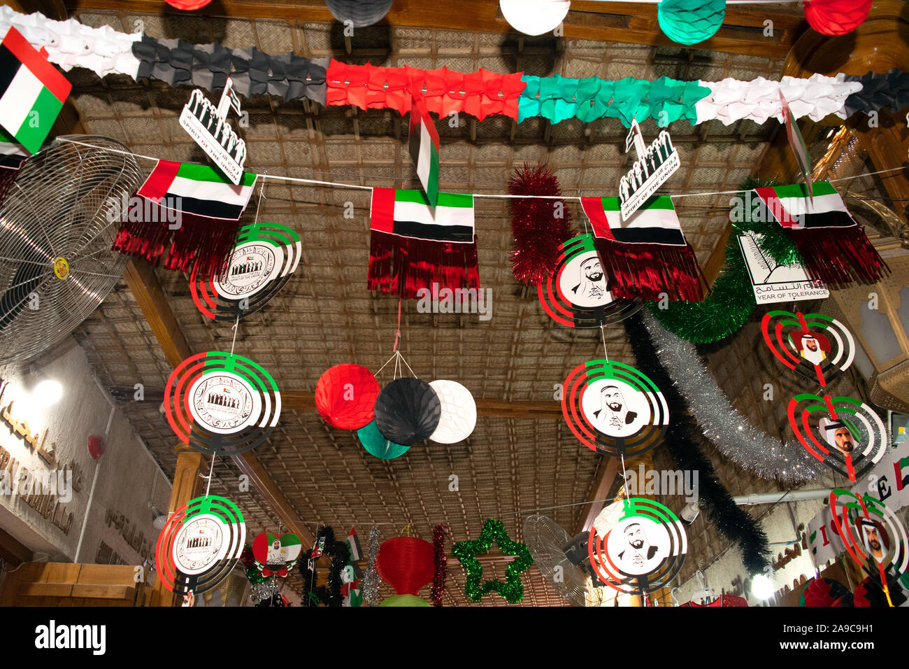 Dubai / UAE - November 9, 2019: Many UAE flags and decorations on old ...