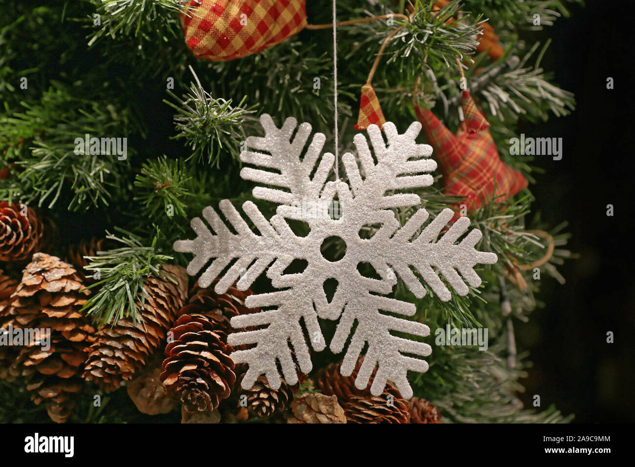 White Snowflake Crystal Decor at Christmas Tree Stock Photo - Alamy