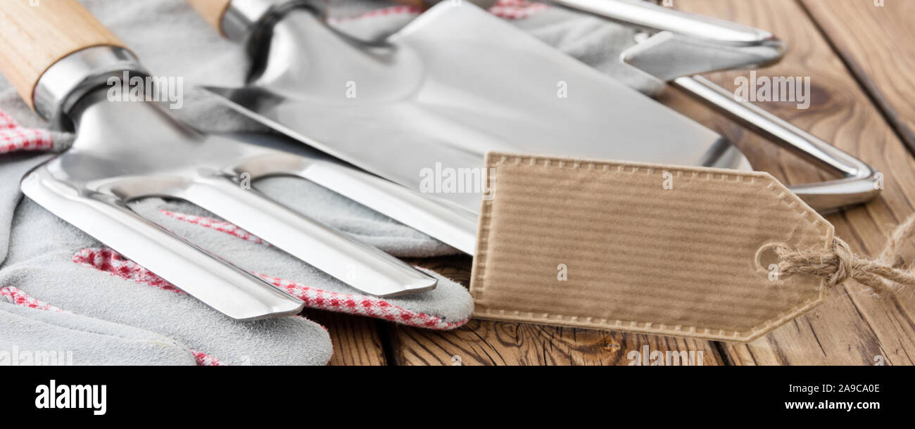 Gardening tools and label background Stock Photo - Alamy