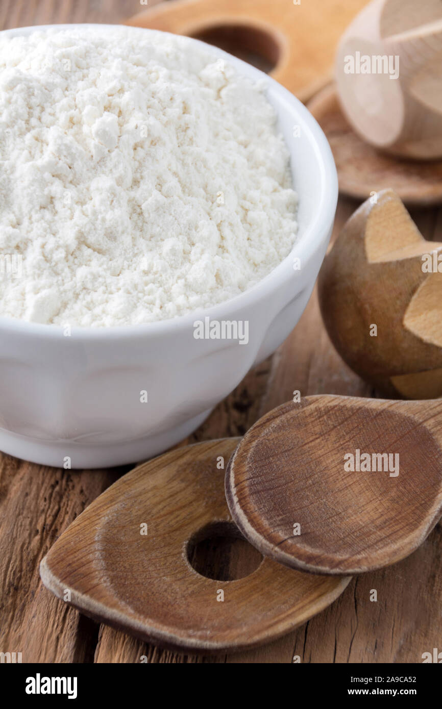 Baking with flour and wooden tools Stock Photo - Alamy