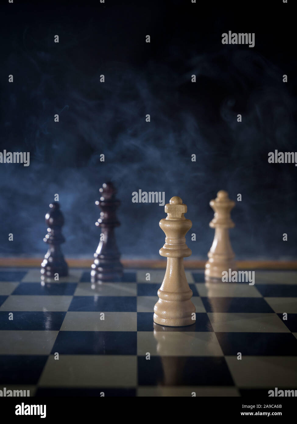 Chess board game concept of battle, war and strategy. Chess figures on ...