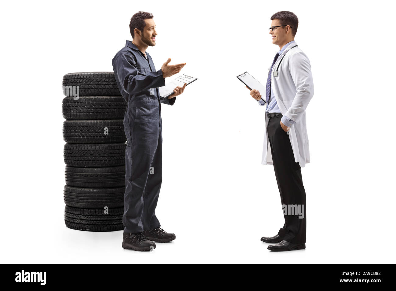 Full length profile shot of an auto mechanic explaining to a doctor ...