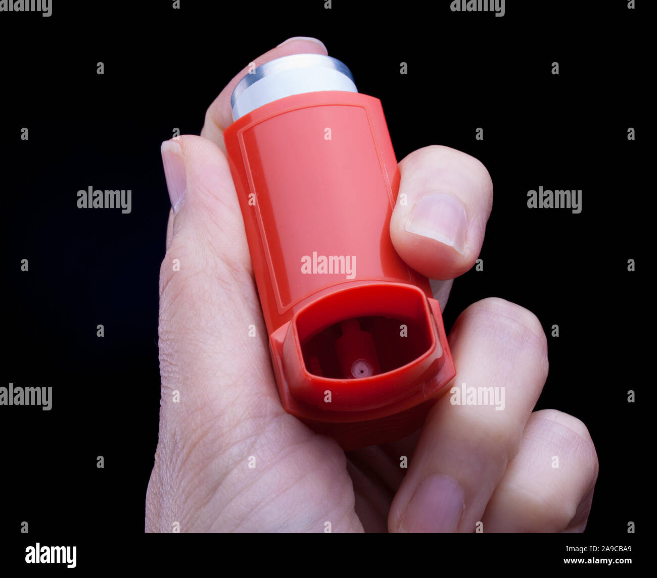 Bronchitis asthma inhaler on black background Stock Photo - Alamy