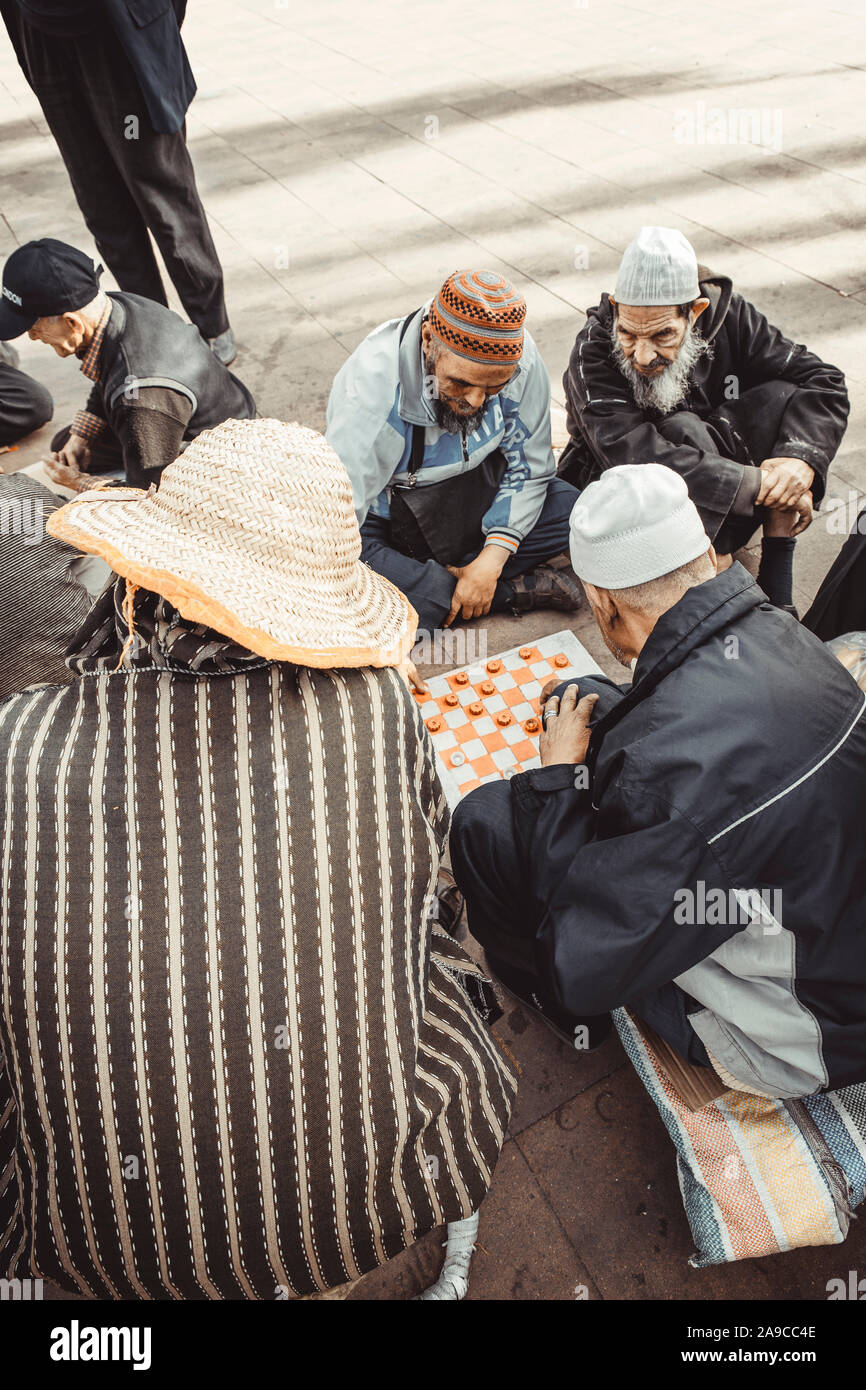 People playing traditional street games Stock Photo - Alamy