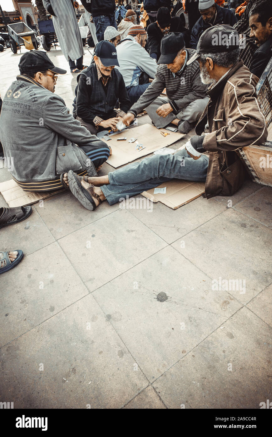 People playing traditional street games Stock Photo - Alamy