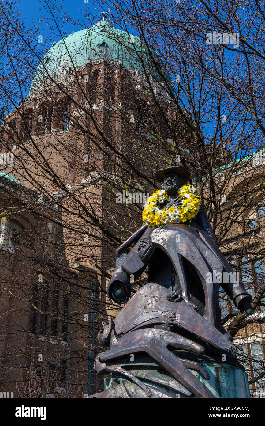 A statue of Pere Damien, located at the Basilica of the Sacred Heart in ...