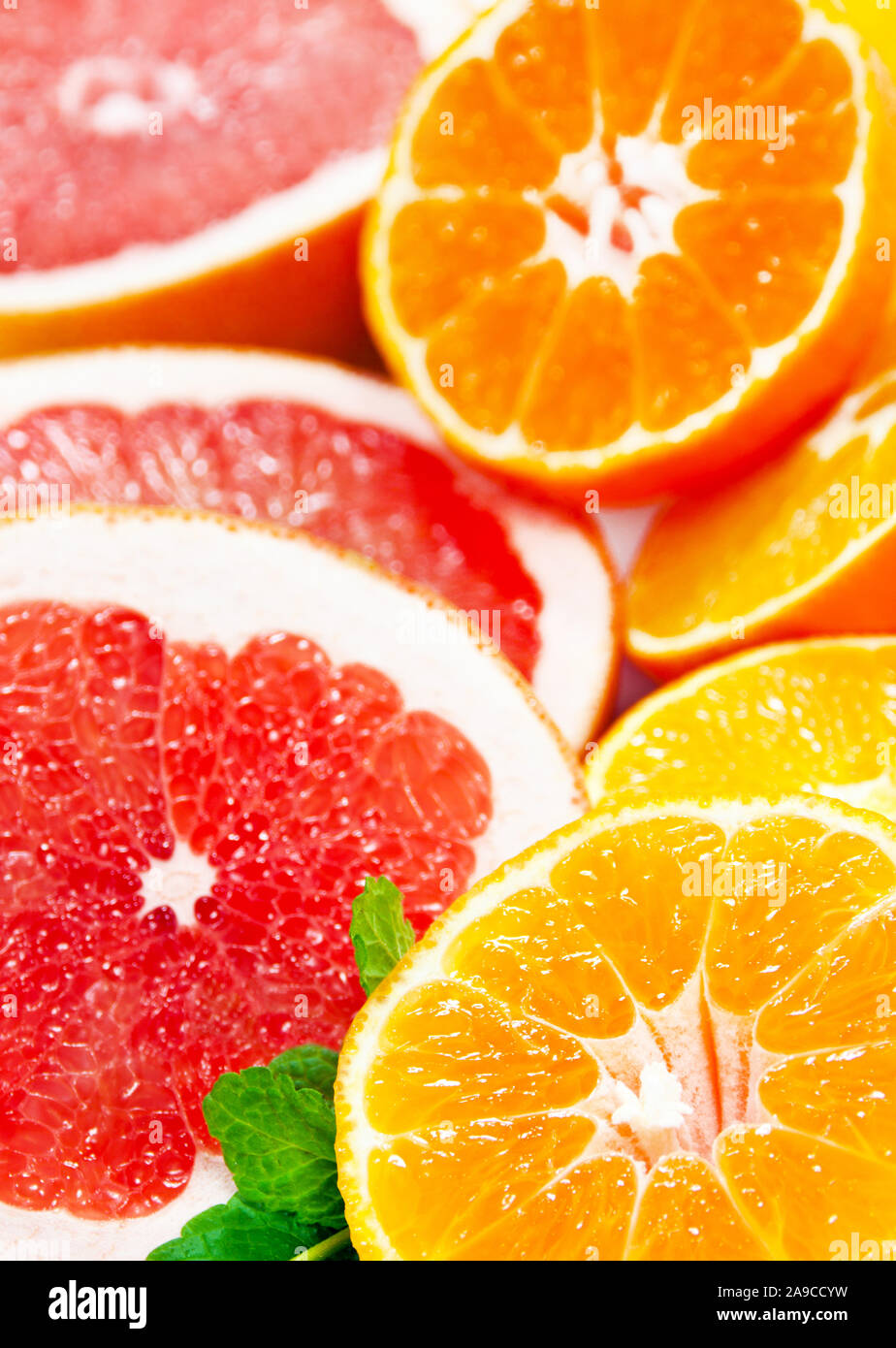 Various citrus fruits close up Stock Photo - Alamy