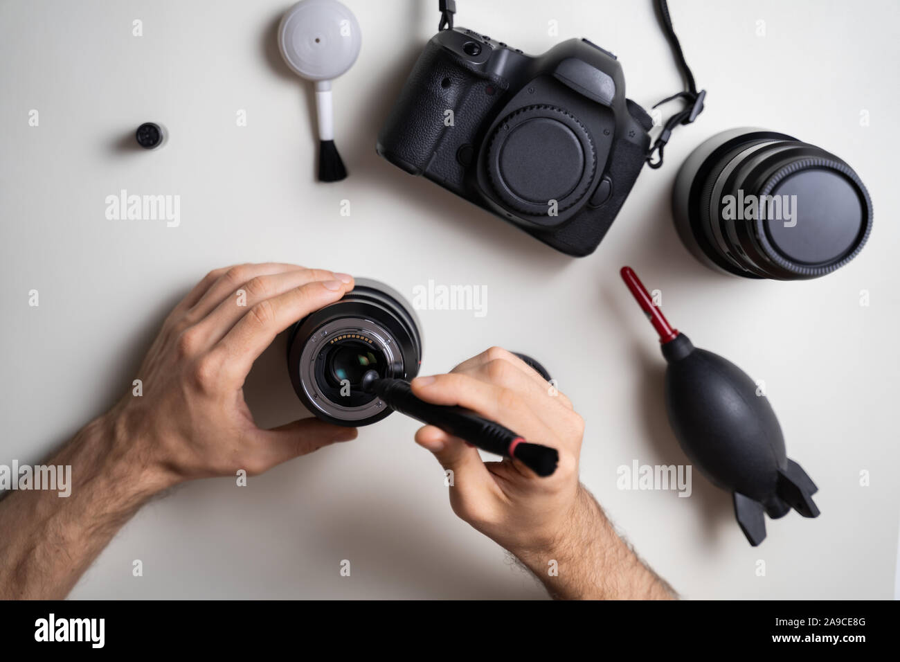 Person cleaning camera sensor hi-res stock photography and images - Alamy