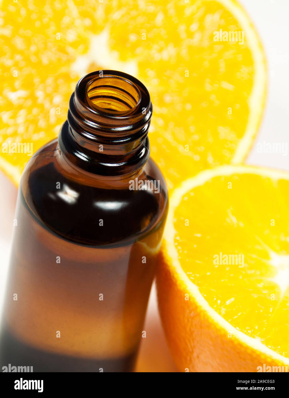 Orange oil and citrus fruits Stock Photo - Alamy