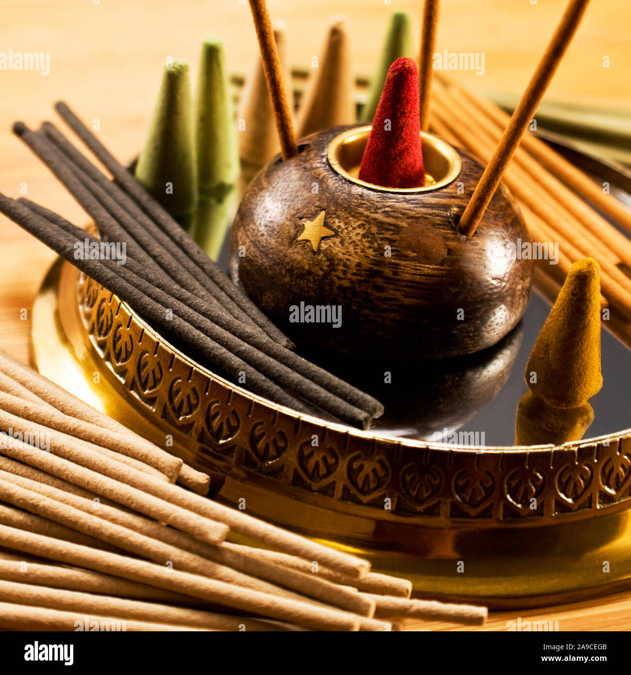 Various incense cones and sticks close up Stock Photo - Alamy