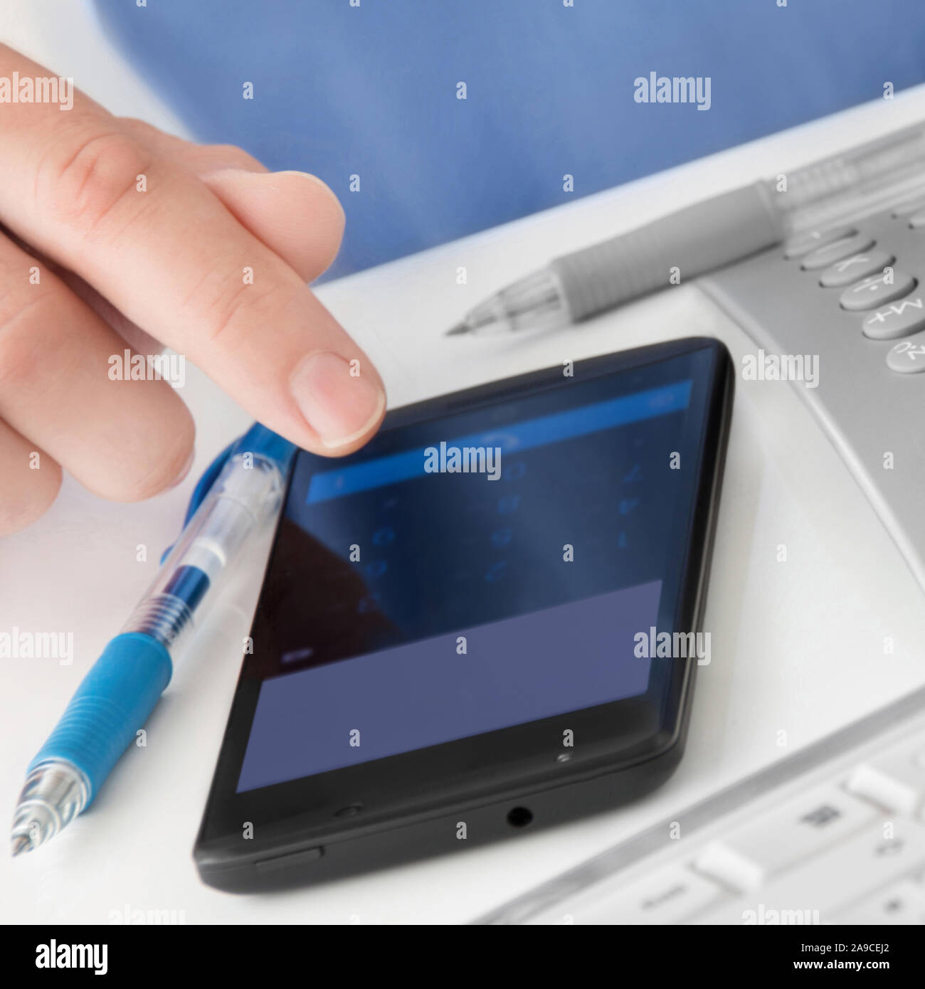 Male hand and smartphone Stock Photo - Alamy