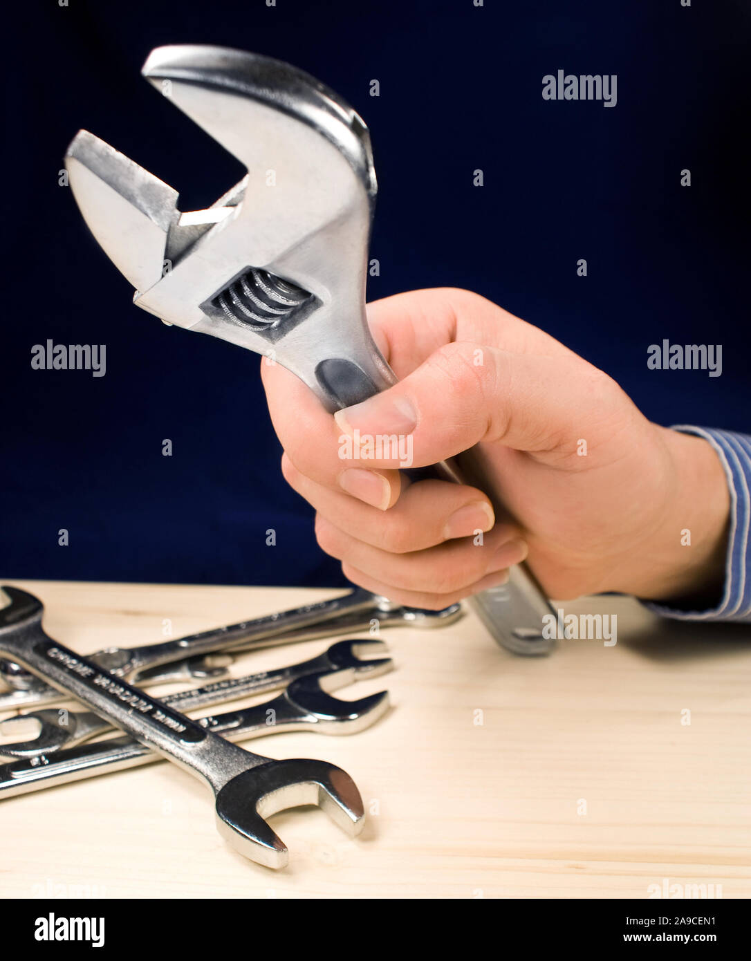 Male hand and tools Stock Photo - Alamy