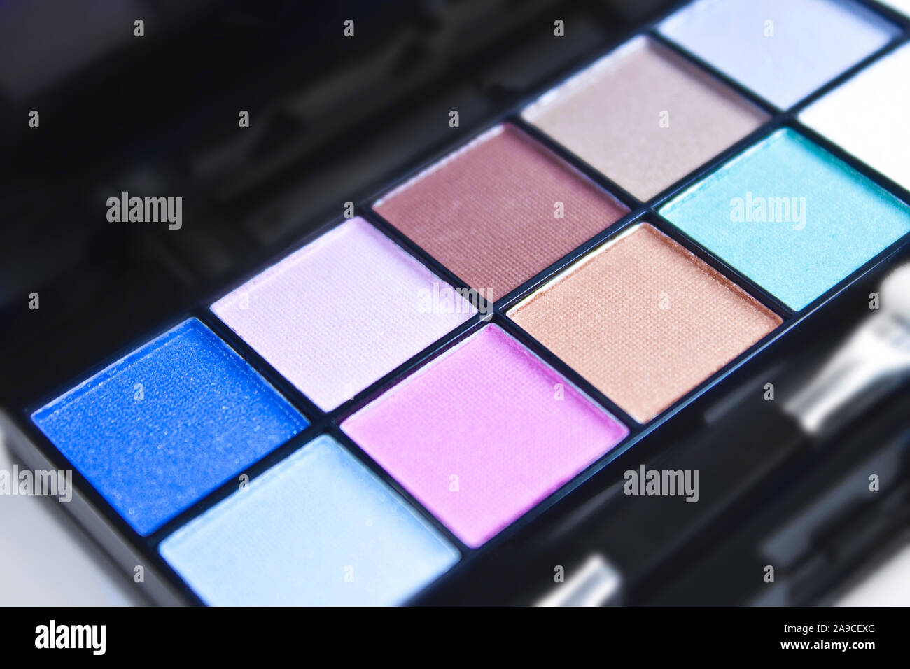 Cosmetics powder various colors Stock Photo - Alamy