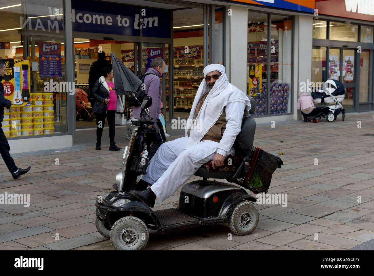 Wolverhampton, Britain, Uk Street photography man on Mobility Scooter ...