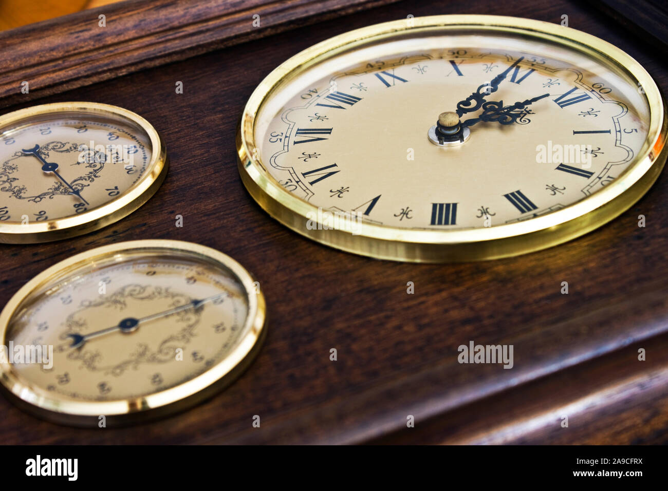 Old measuring instrument and clock Stock Photo - Alamy