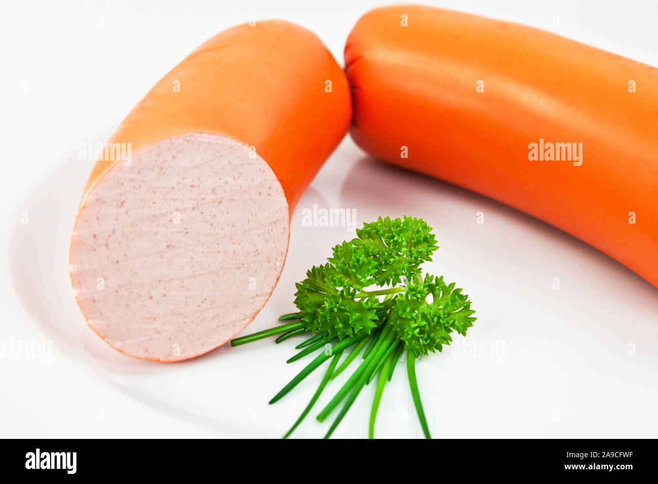 Two sausages on white background Stock Photo - Alamy
