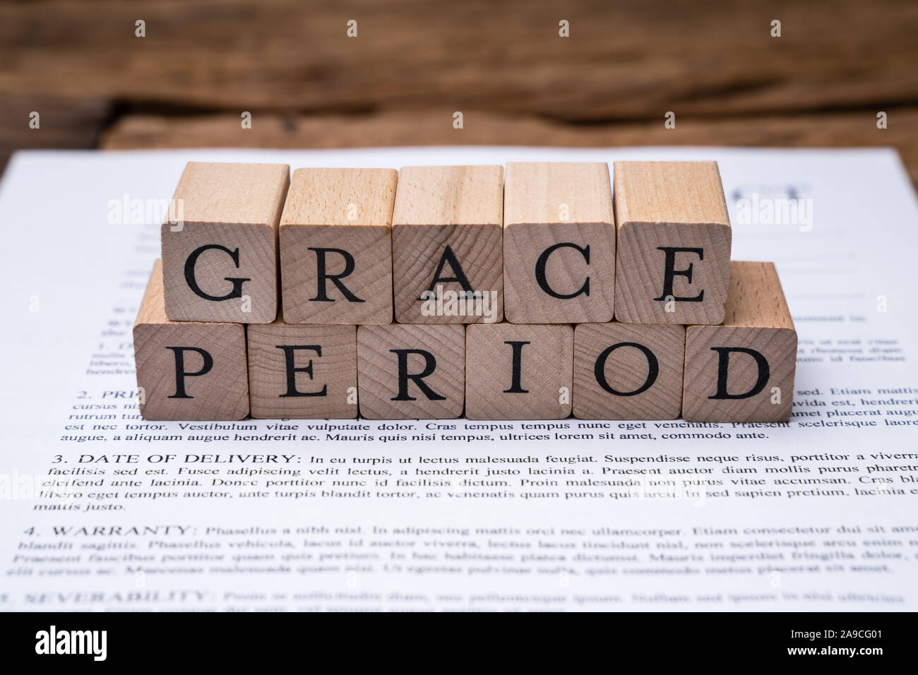 Stacked Of Grace Period Blocks On Paper Documents Over The Desk Stock ...