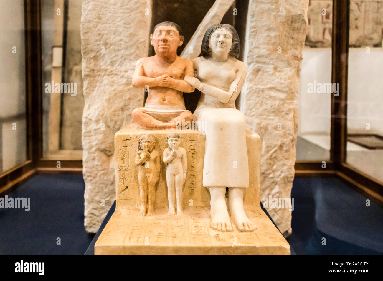 Cairo, Egypt - April 19, 2019: Statue of the dwarf Seneb, his wife and ...