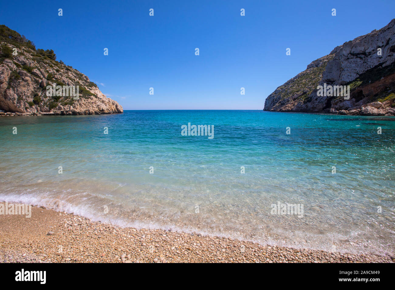 A view of the stunning La Granadella beach in Javea, Spain Stock Photo ...