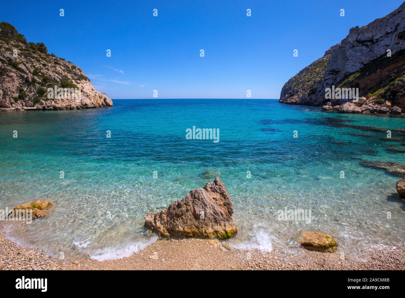 A view of the stunning La Granadella beach in Javea, Spain Stock Photo ...