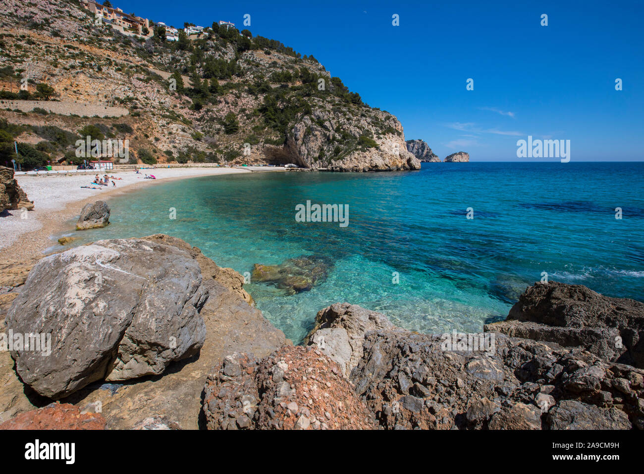 A view of the stunning La Granadella beach in Javea, Spain Stock Photo ...