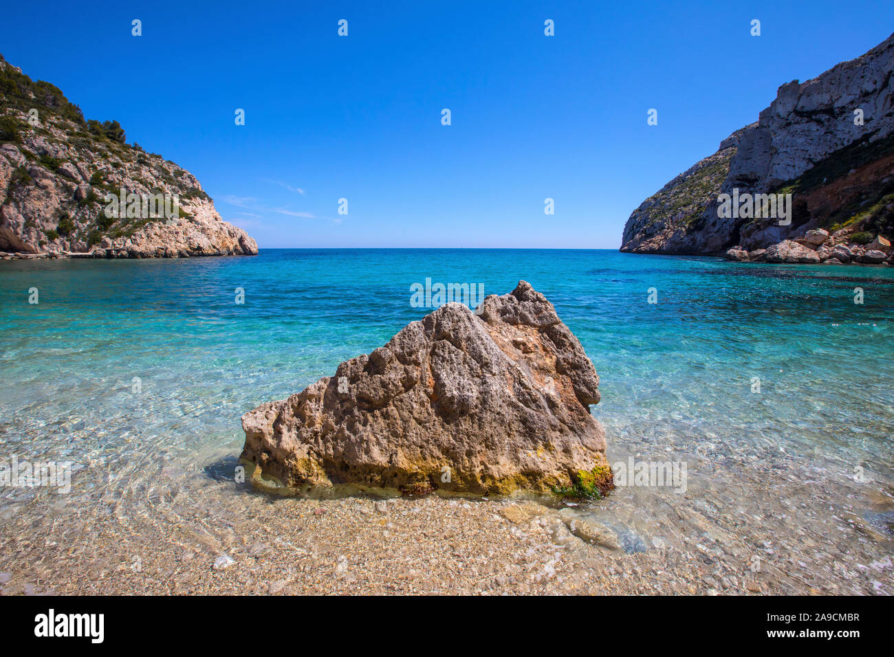 A view of the stunning La Granadella beach in Javea, Spain Stock Photo ...