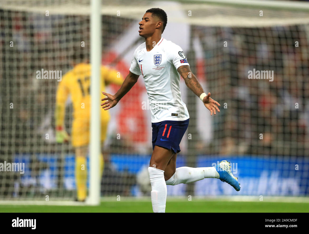 England's Marcus Rashford celebrates scoring his side's fourth goal of ...