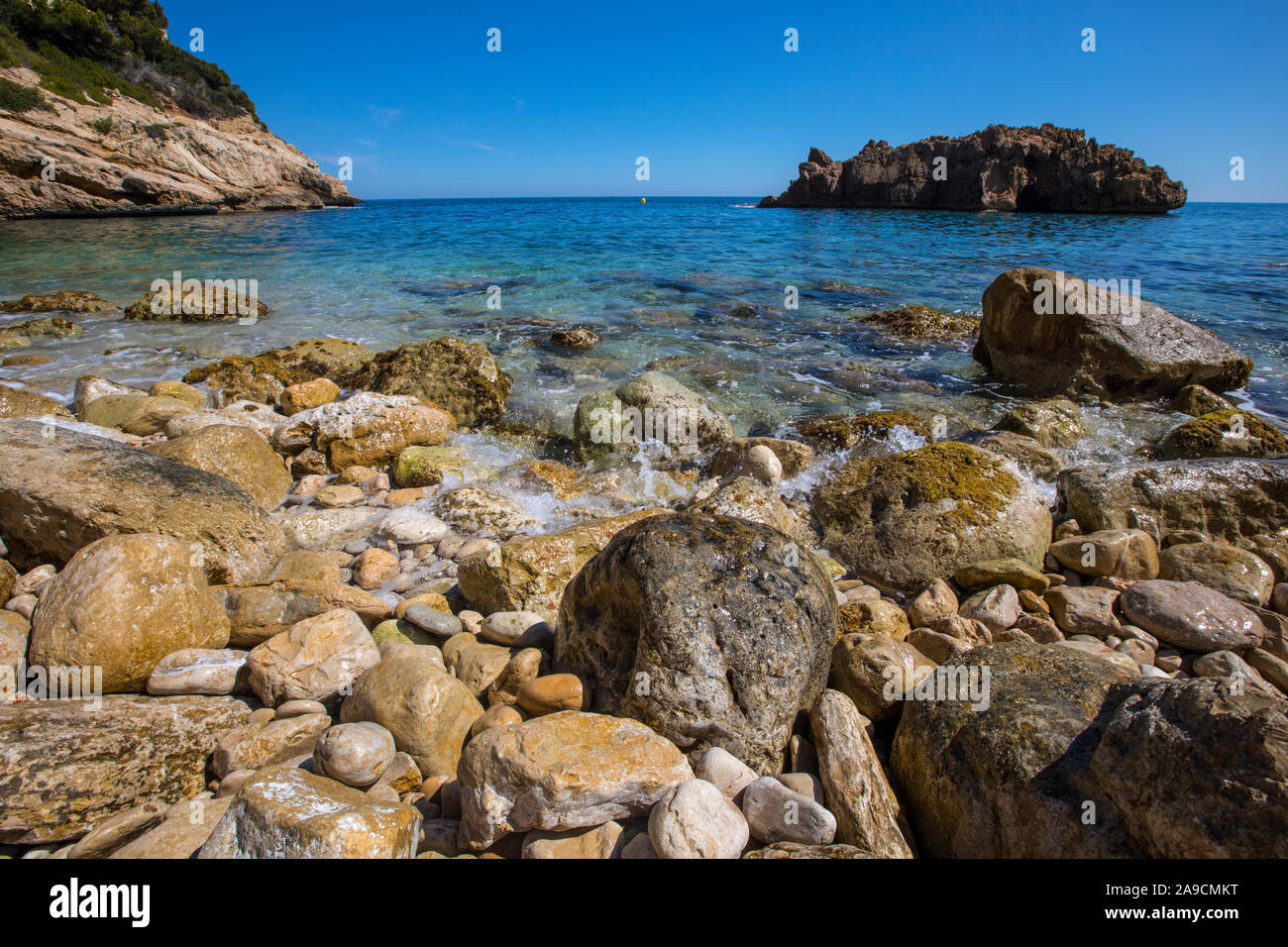 A view of the stunning Ambolo Beach in Javea, Spain Stock Photo - Alamy