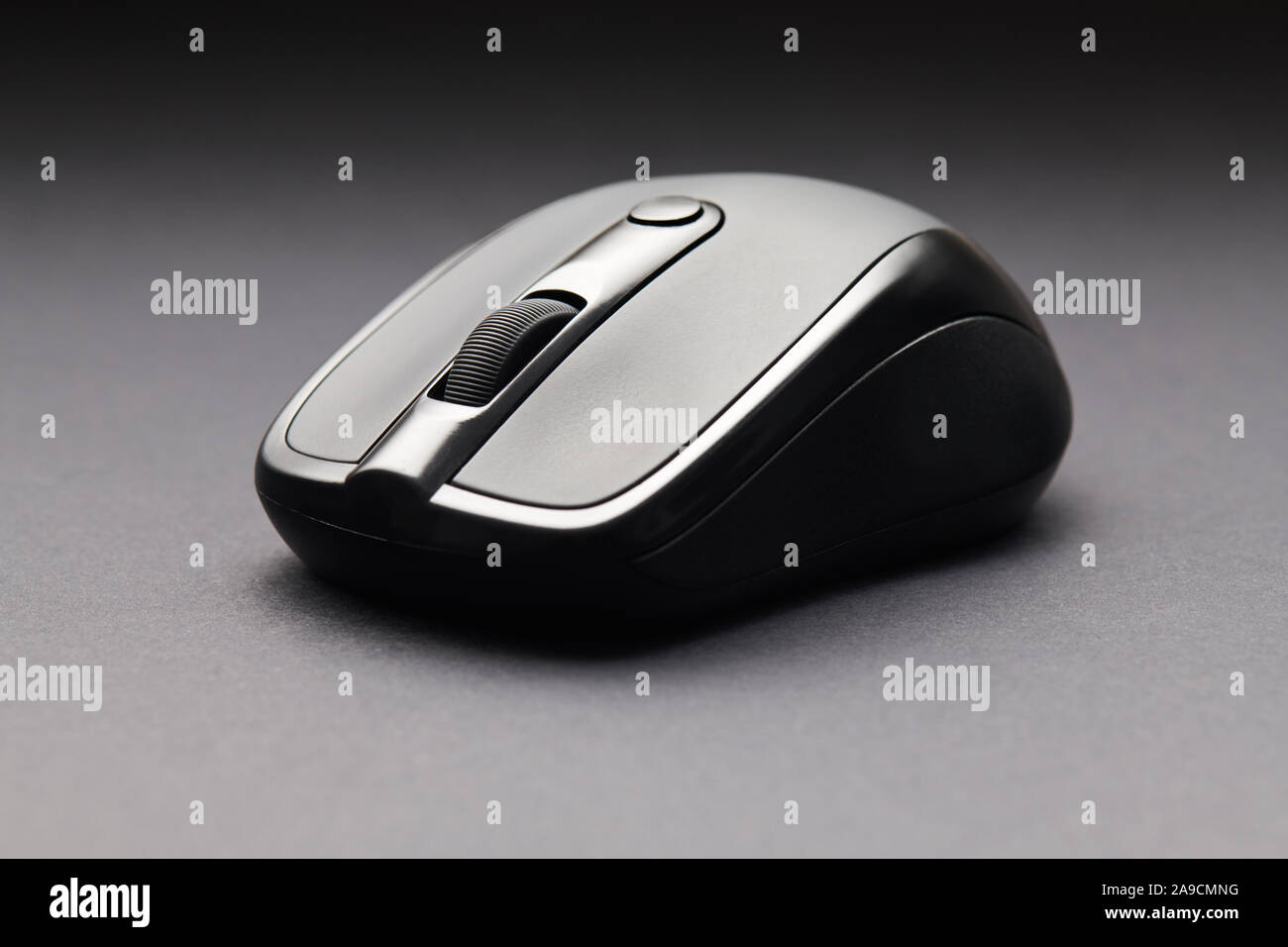 wireless computer mouse on black background Stock Photo - Alamy