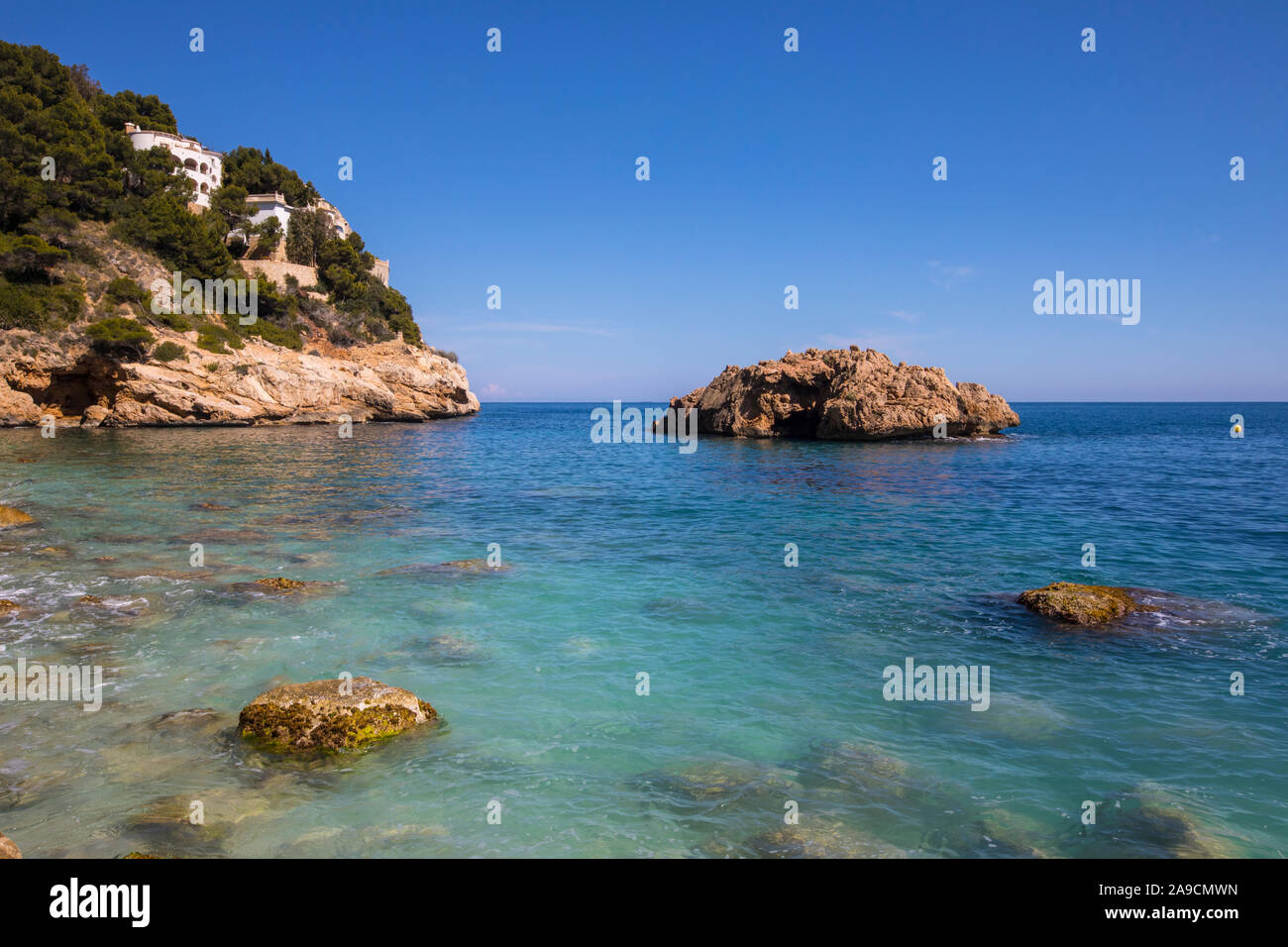 A view of the stunning Ambolo Beach in Javea, Spain Stock Photo - Alamy