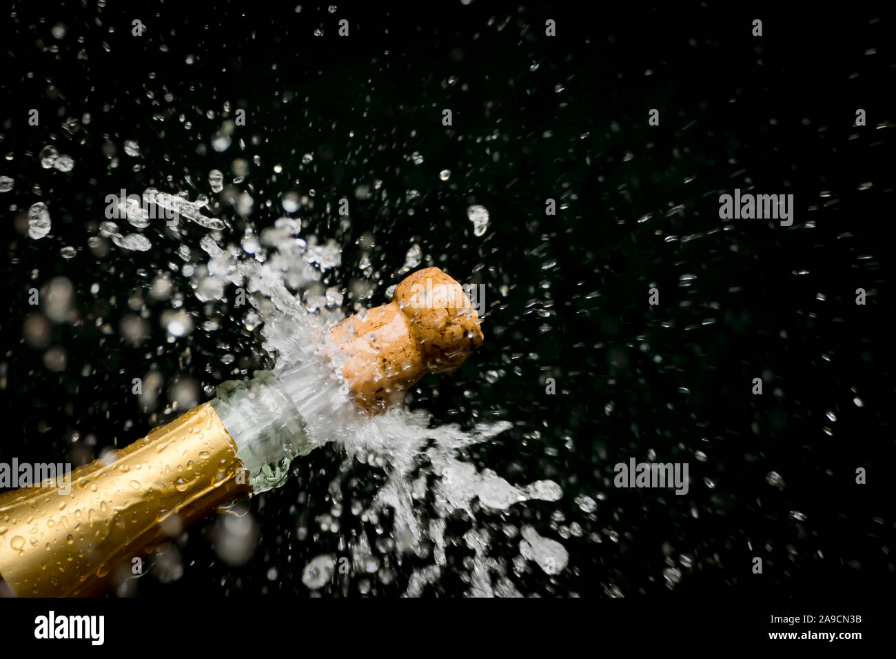 An image of a champagne cork popping out Stock Photo - Alamy
