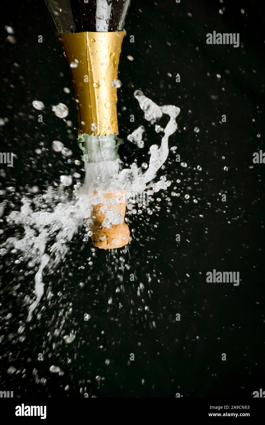 An image of a champagne cork popping out Stock Photo - Alamy