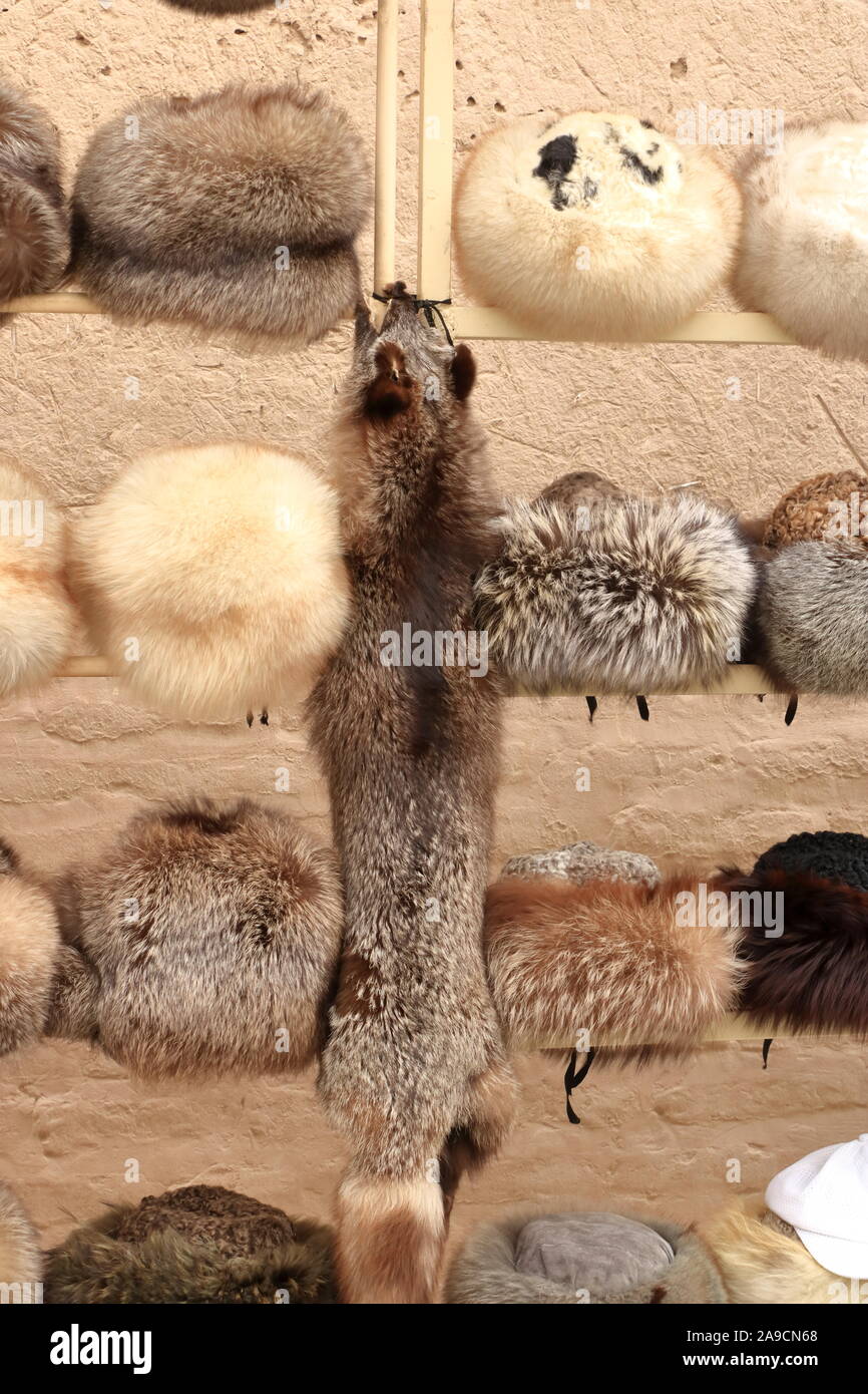 Sale of fur caps in a market in uzbekistan Stock Photo - Alamy