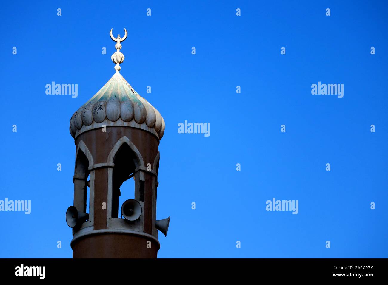 Crescent symbol of Islam on top of the dome of a minaret of a dome ...