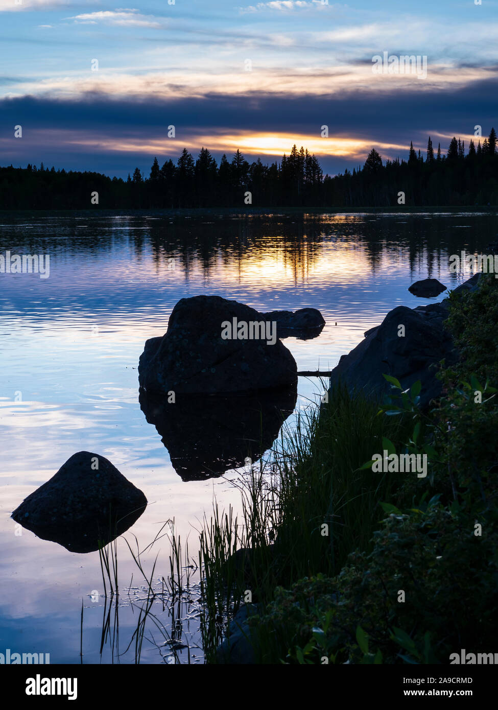 Sunset at Sunset Lake, Grand Mesa National Forest, Colorado Stock Photo ...